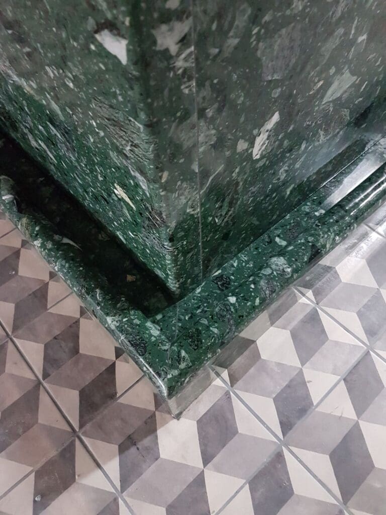 Conglomerate countertop and cladding for Record Hall - Diespeker & Co